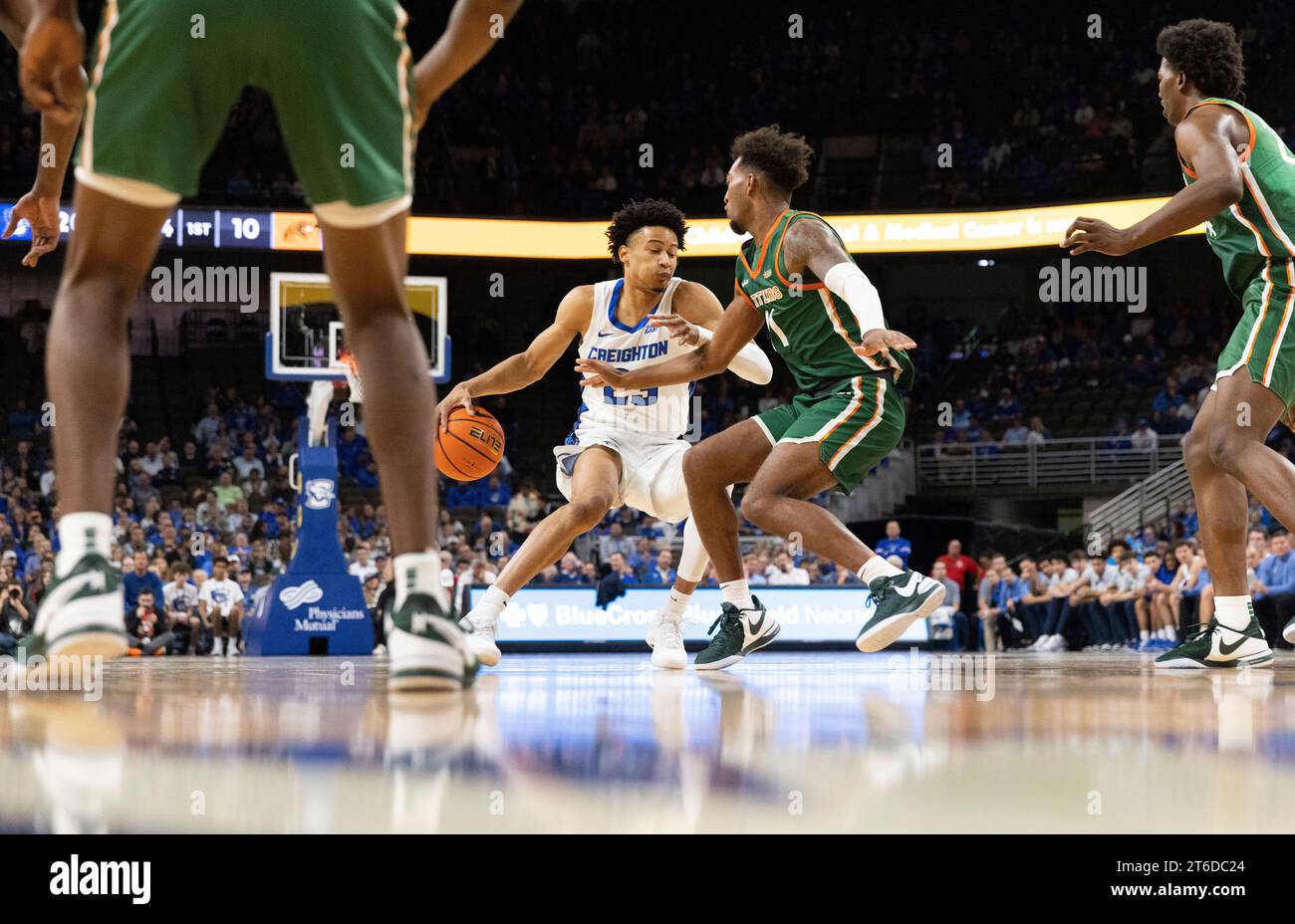 Creighton's Trey Alexander, left, drives down court against Florida A&M ...
