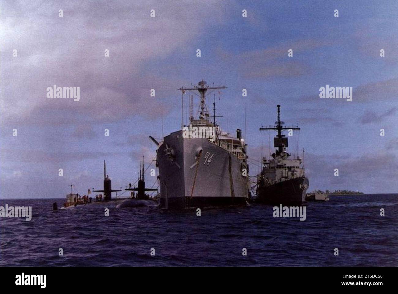 USS Dixie (AD-14) with USS Brooke (FFG-1) and two submarines alongside ...