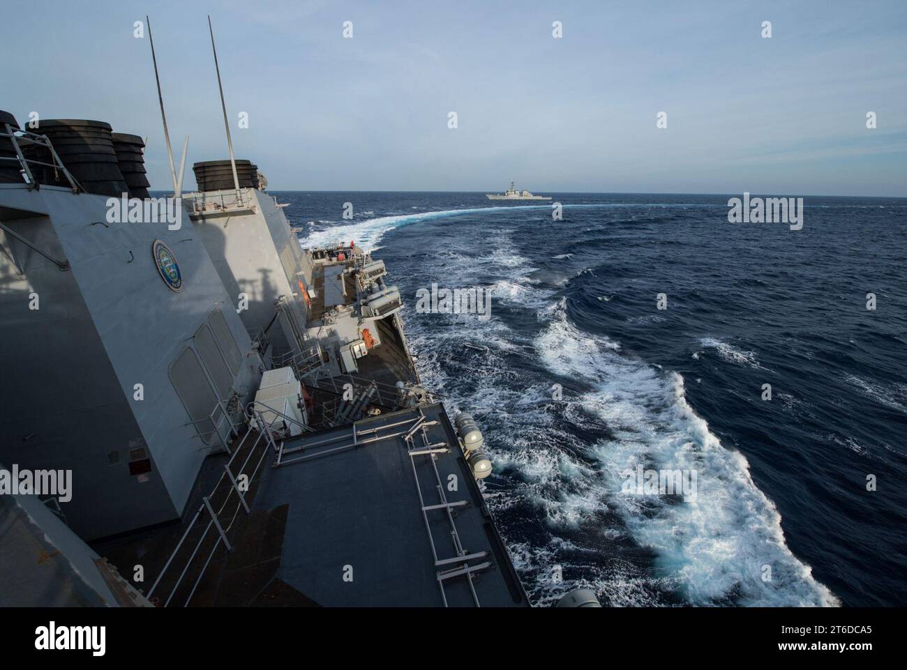 USS Donald Cook (DDG 75) makes a hard turn after completing a passenger ...