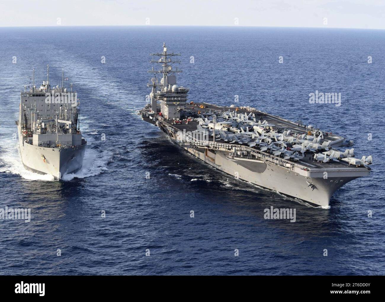 USS Dwight D. Eisenhower conducts a replenishment-at-sea with USNS ...