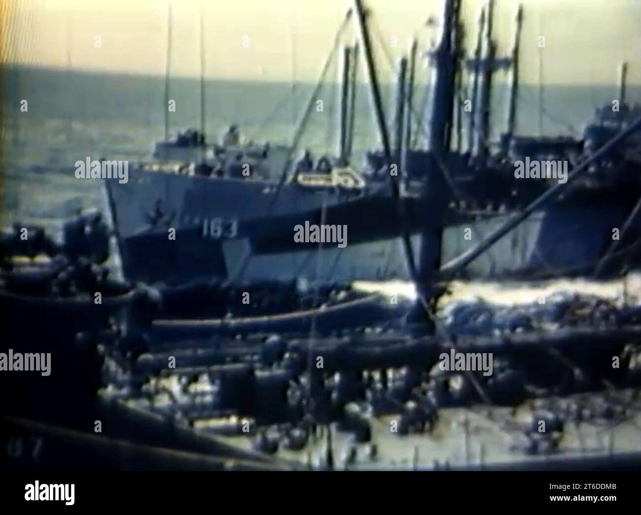 USS Eastland (APA-163) is refueled by the fleet oiler USS Sebec (AO-87 ...