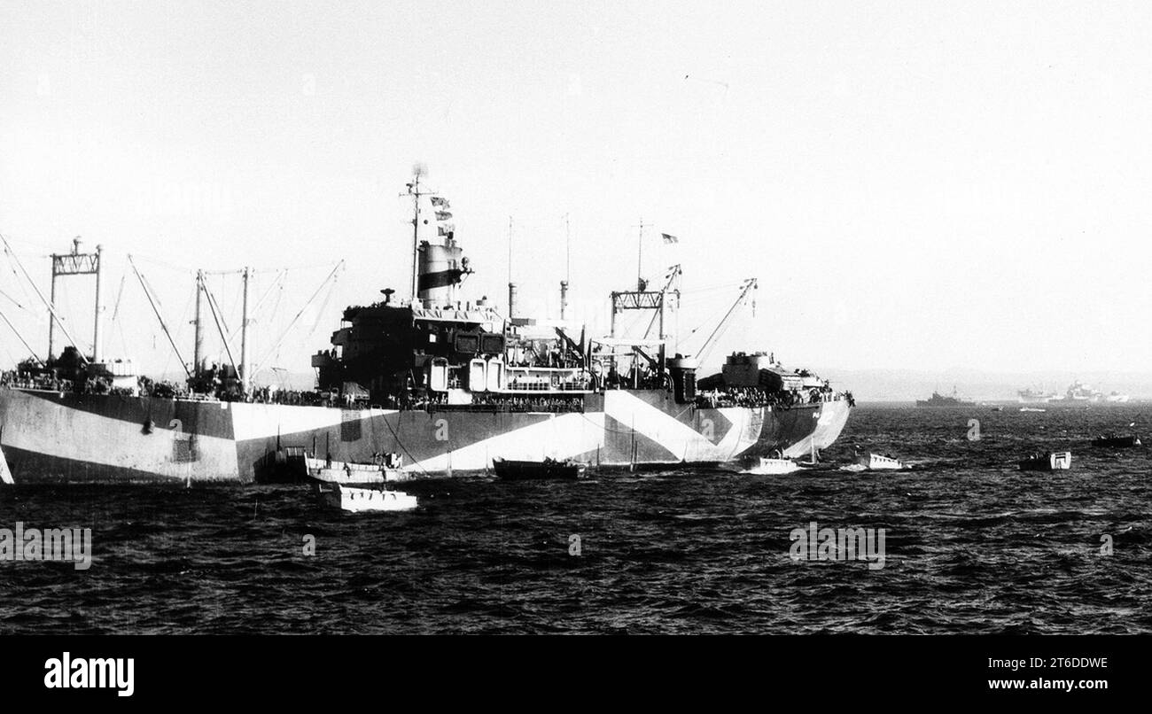 USS Elmore (APA-42) unloading at Okinawa, Japan, in April 1945 Stock ...