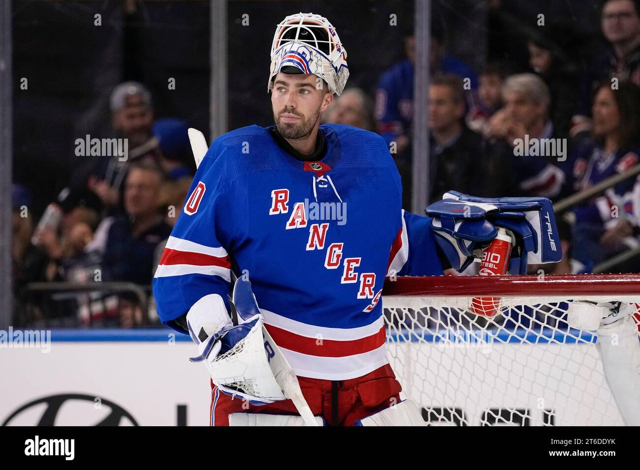 New York Rangers goaltender Louis Domingue looks down ice during a ...