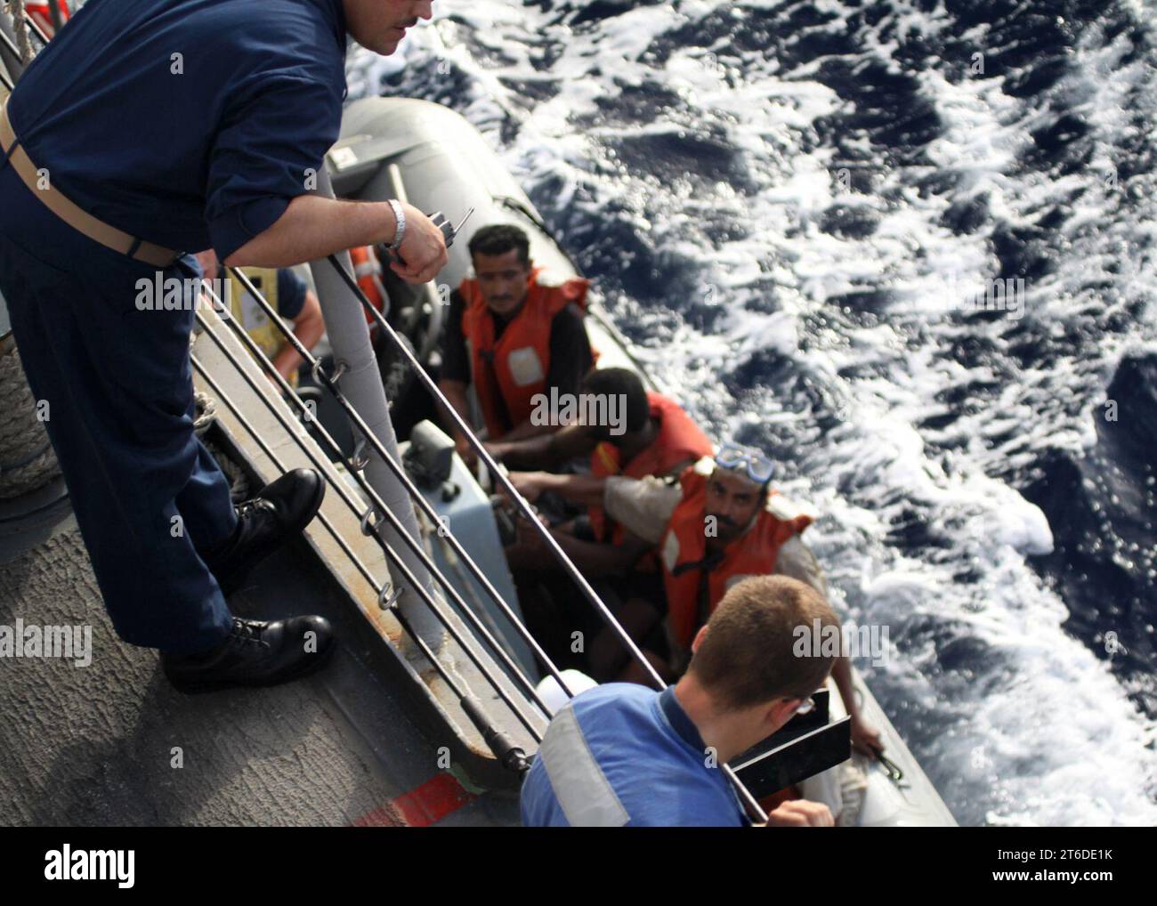 USS Elrod Rescues Stranded Mariners Of Sunken Ship Stock Photo - Alamy