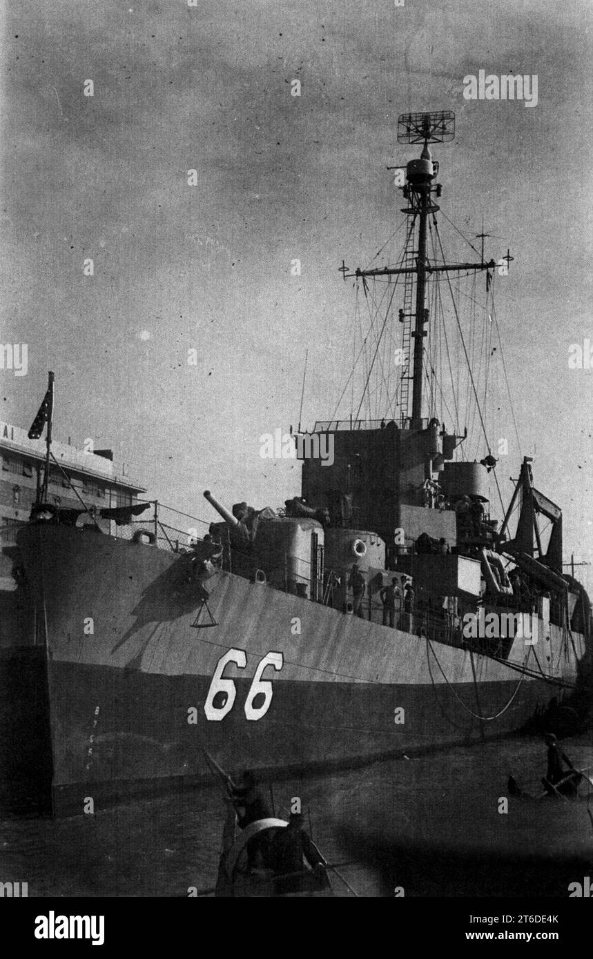 USS Enright (APD-66) docked on the Whangpoo River at Shanghai, China ...
