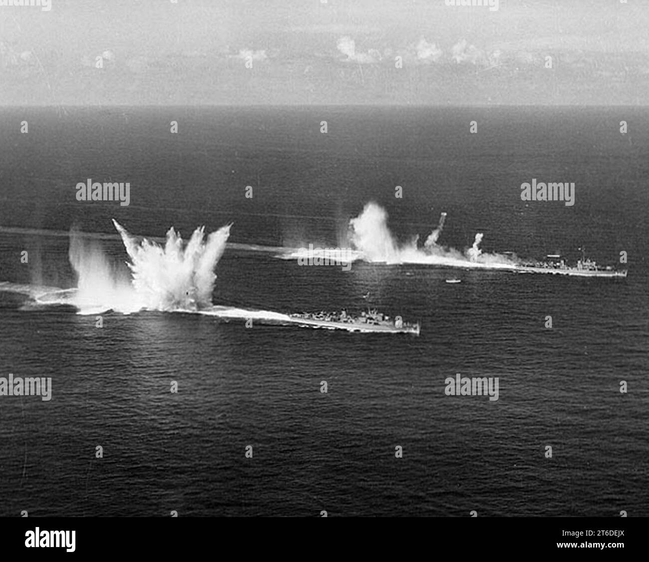 USS Epperson (DDE-719) and USS Sarsfield (DDE-837) dropping depth ...