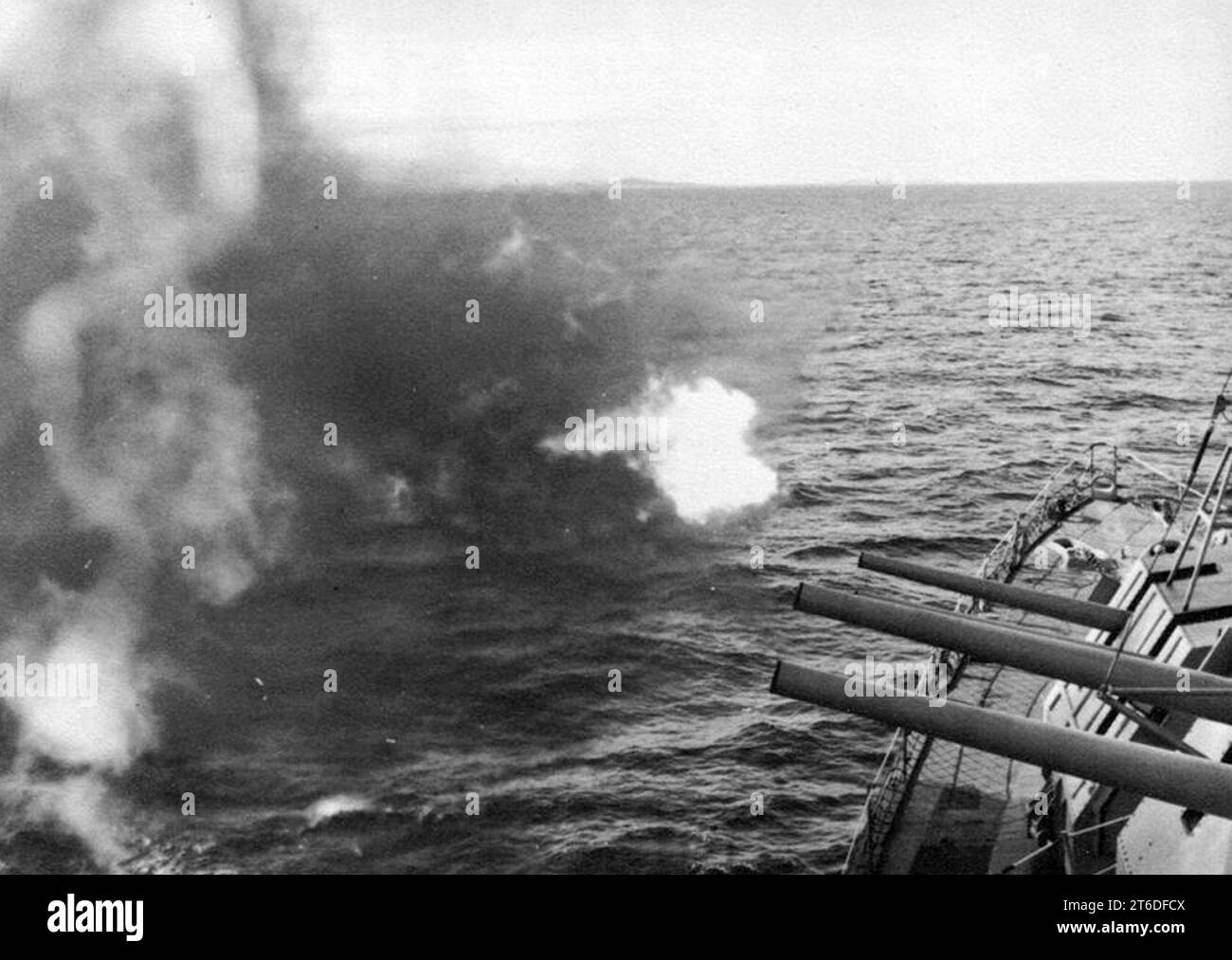 USS Everett F. Larson (DD-830) shelling targets in Vietnam, in 1965 ...
