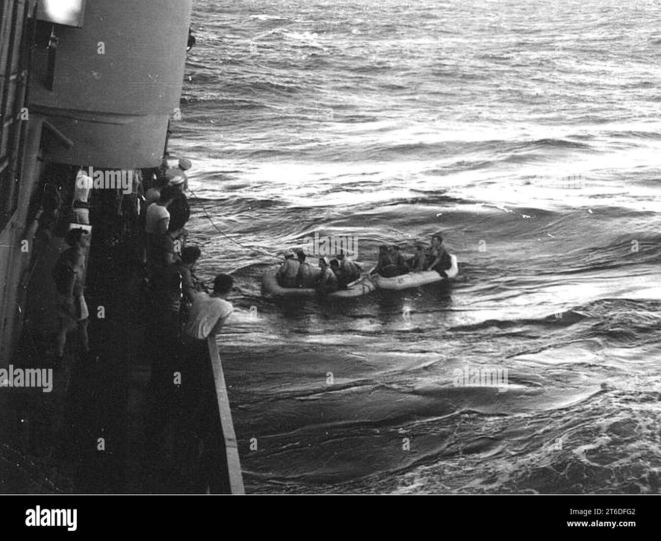 USS Farquhar (DE-139) rescues crew of a crashed Consolidated PBY ...