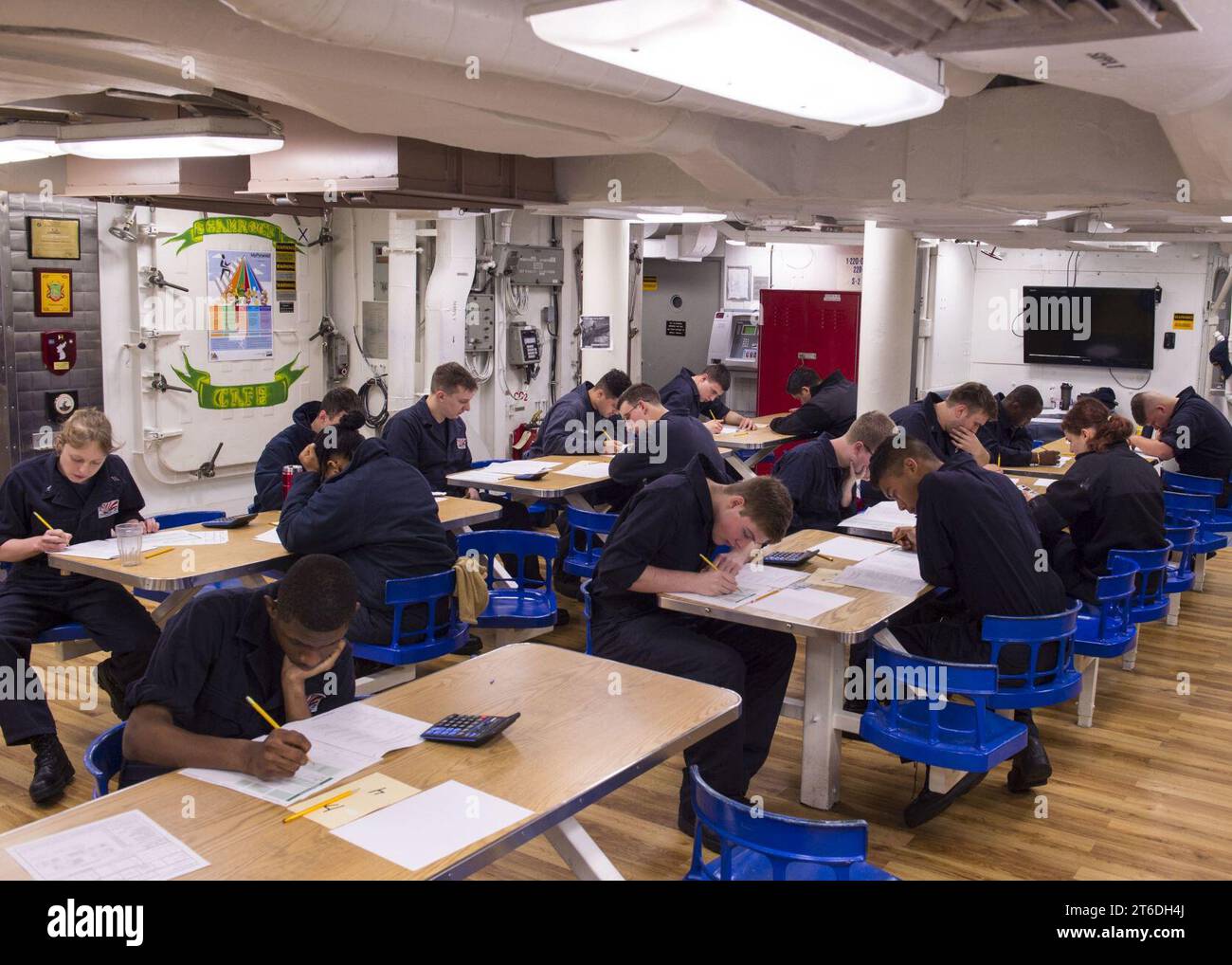 USS Fitzgerald Sailors take the E-4 advancement exam 160317 Stock Photo ...