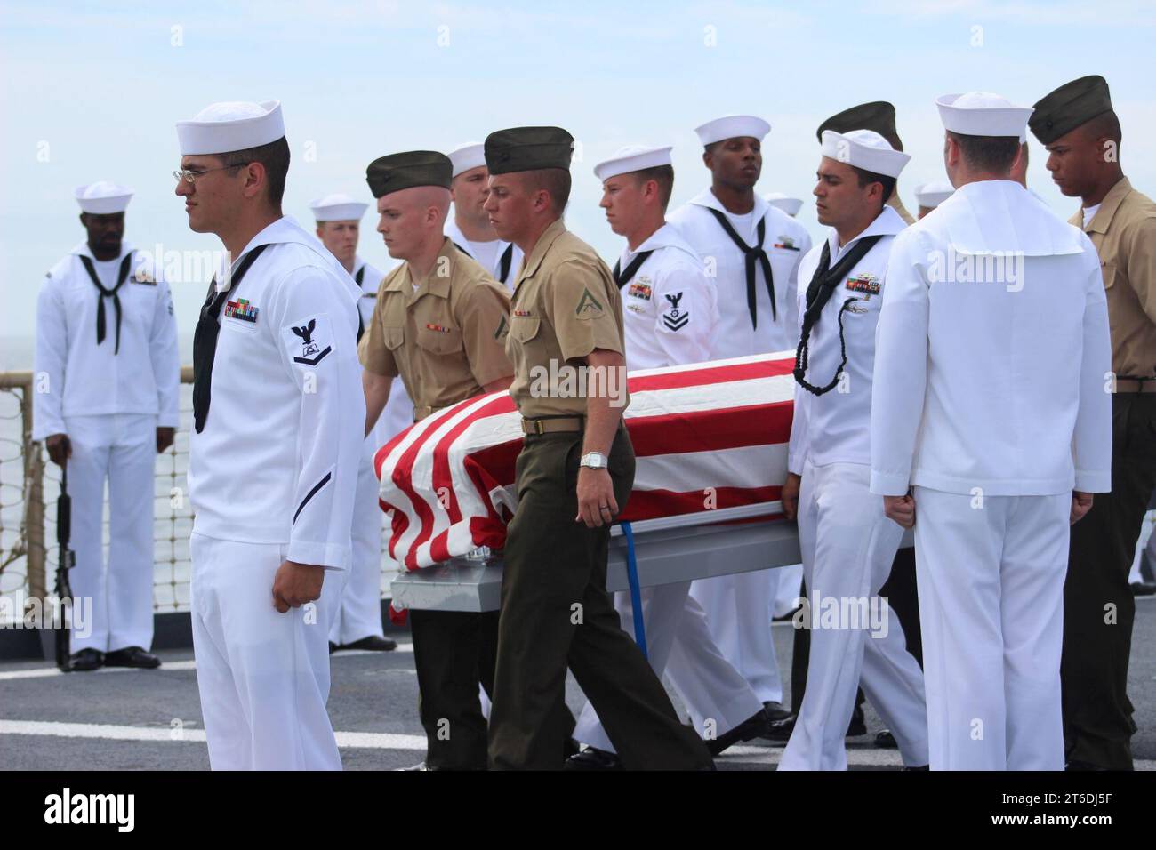 USS Fort McHenry conduct a burial at sea ceremony 120714 Stock Photo ...