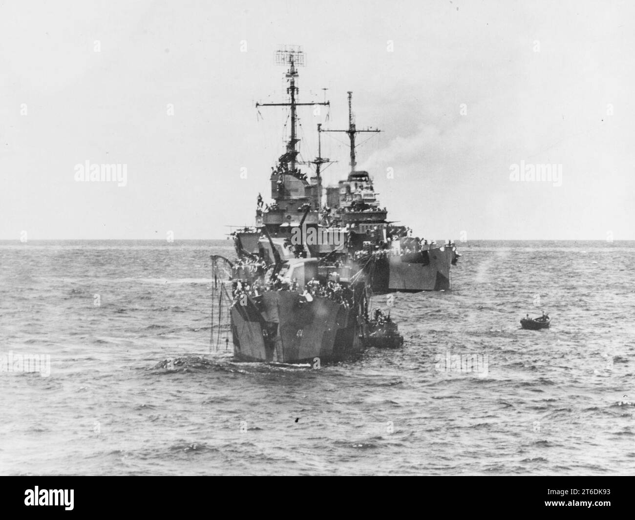 USS Fullam (DD-474) recovers survivors of USS Noa (APD-24) after their ...