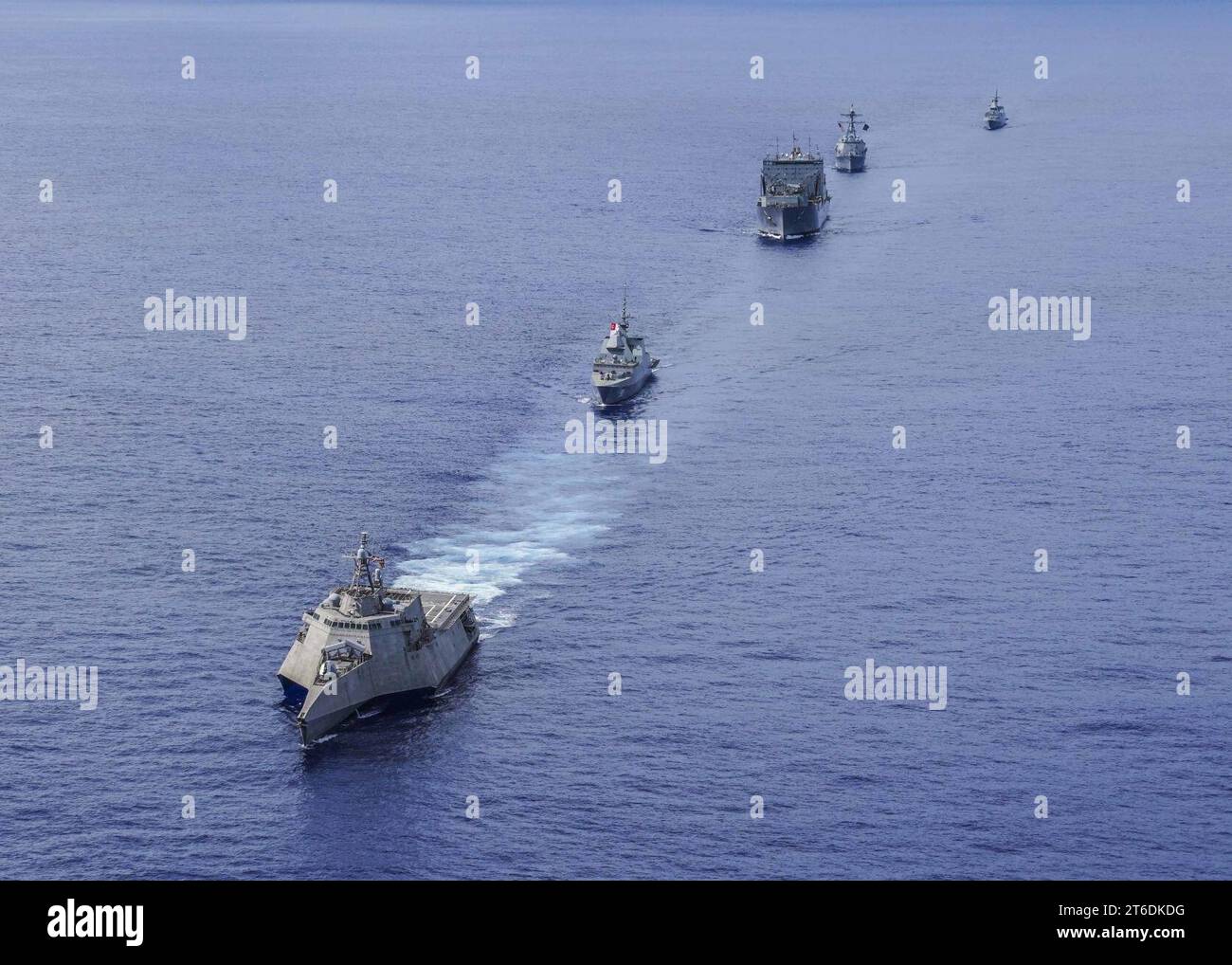 USS Gabrielle Giffords (LCS 10) leads a formation followed by the ...