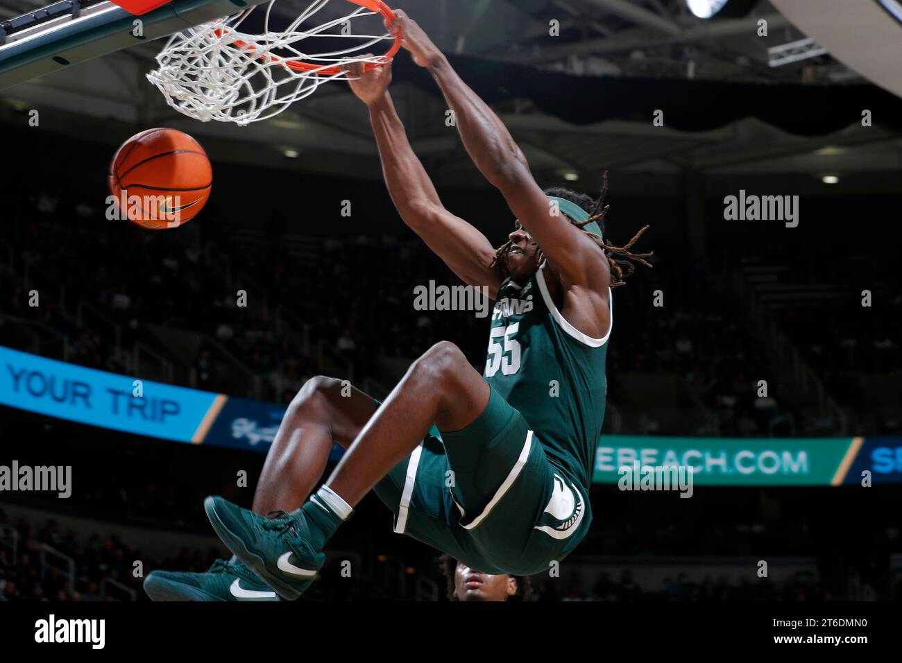 Michigan State's Coen Carr dunks during the second half of an NCAA ...