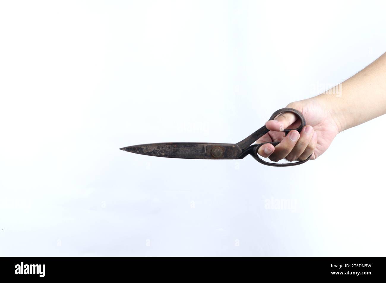 hand holding scissors Stock Photo - Alamy