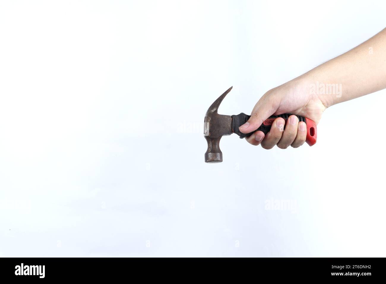 hand holding hammer Stock Photo - Alamy