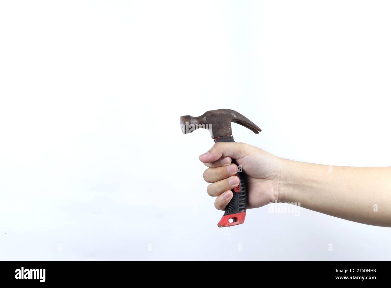 hand holding hammer Stock Photo - Alamy