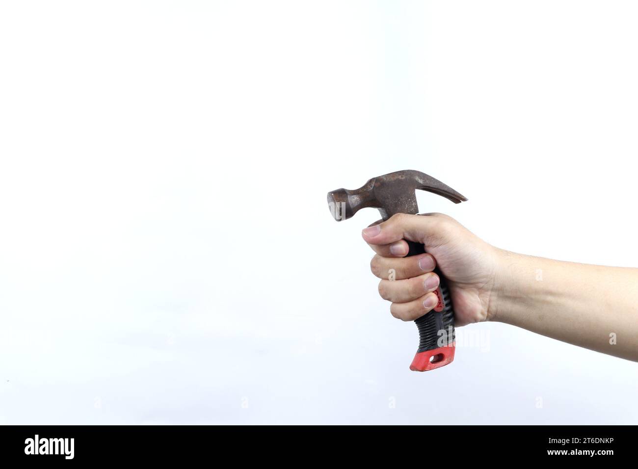 hand holding hammer Stock Photo - Alamy