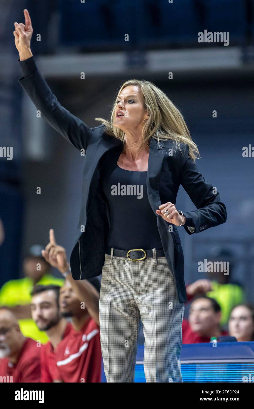 Oklahoma head coach Jennie Baranczyk coaches her players during an NCAA ...