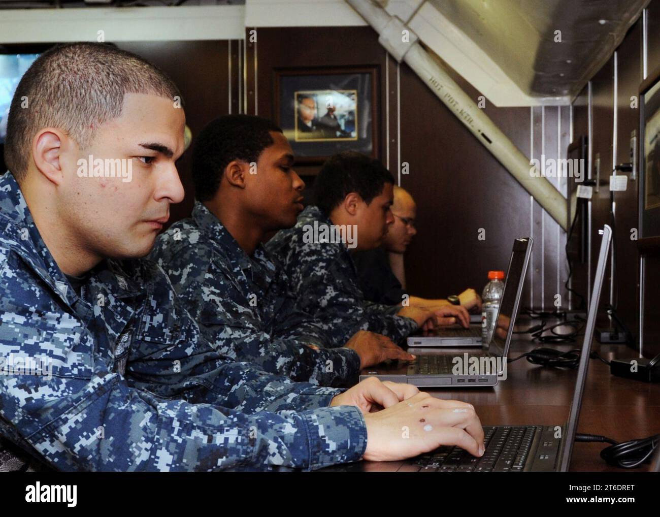 USS George H.W. Bush sailors at work 120620 Stock Photo - Alamy