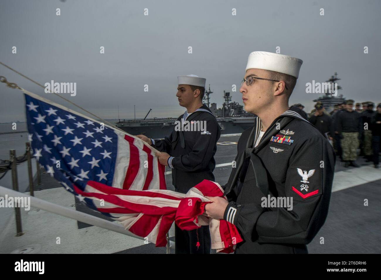 USS George HW Bush flag at half mast Stock Photo - Alamy