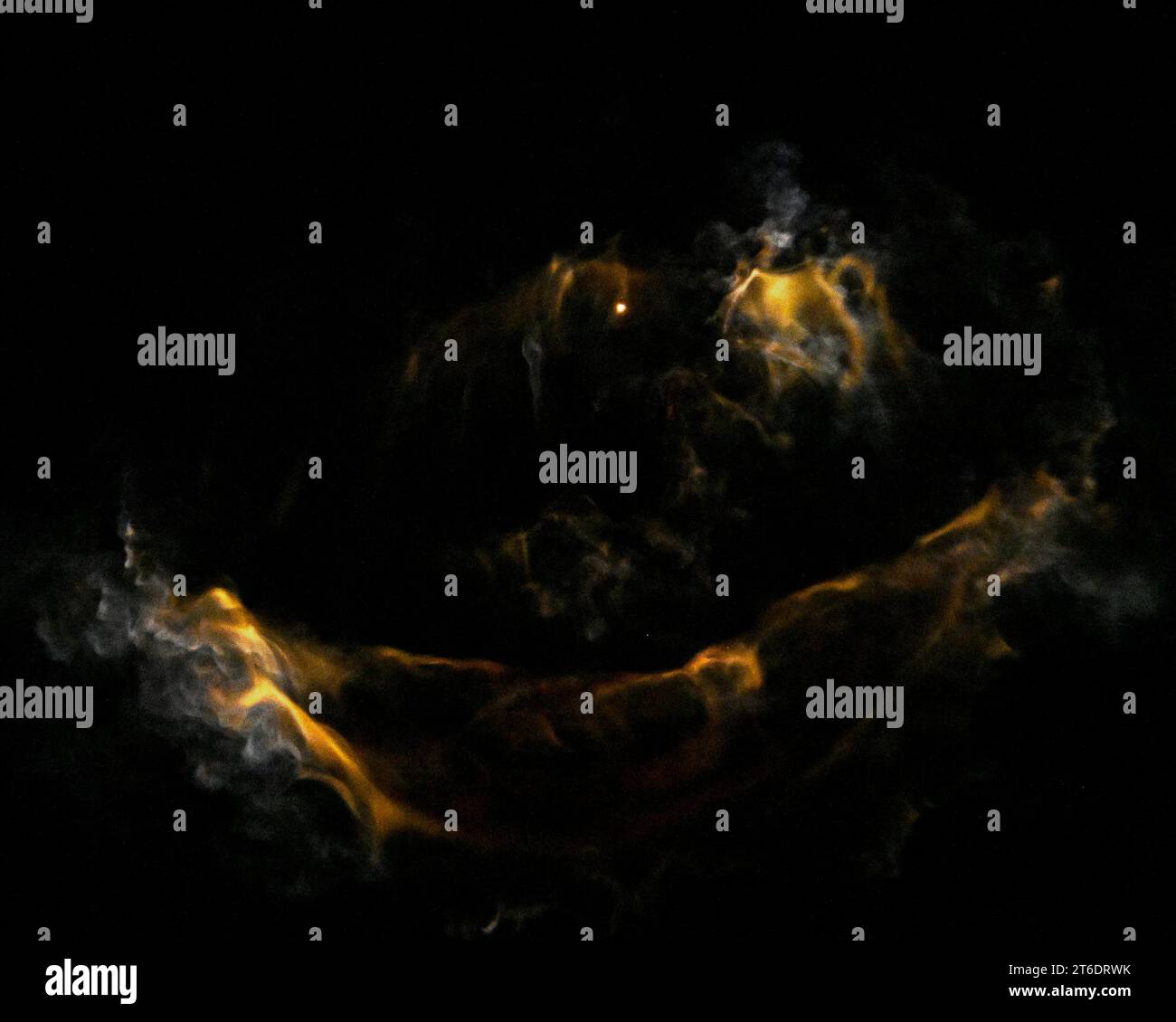 Exhaust plume is illuminated as the SpaceX Falcon 9 rocket stage ...