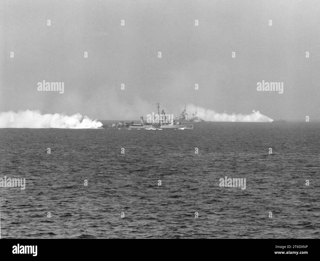 USS Gleaves (DD-423) laying smoke during the invasion of Southern ...