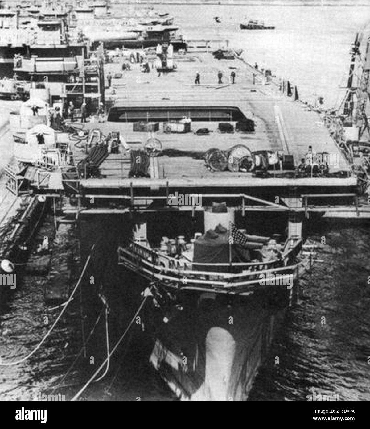 USS Gilbert Islands (CVE-107) being reactivated at the Boston Naval ...