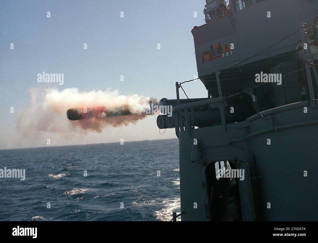 USS Goldsborough (DDG-20) fires a Mark 46 torpedo from a Mark 32 ...