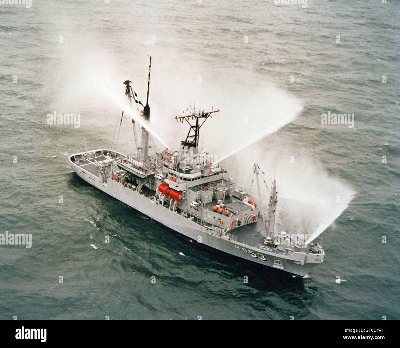 USS Grapple (ARS-53) testing fire hoses in 1986 Stock Photo - Alamy