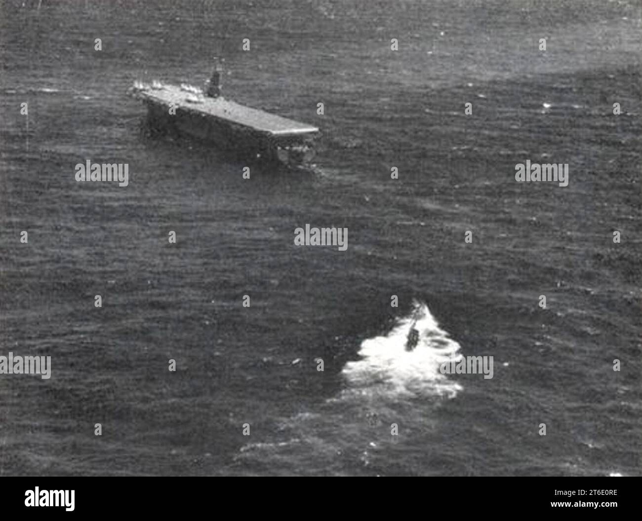 USS Guadalcanal (CVE-60) tows the captured German submarine U-505 in ...