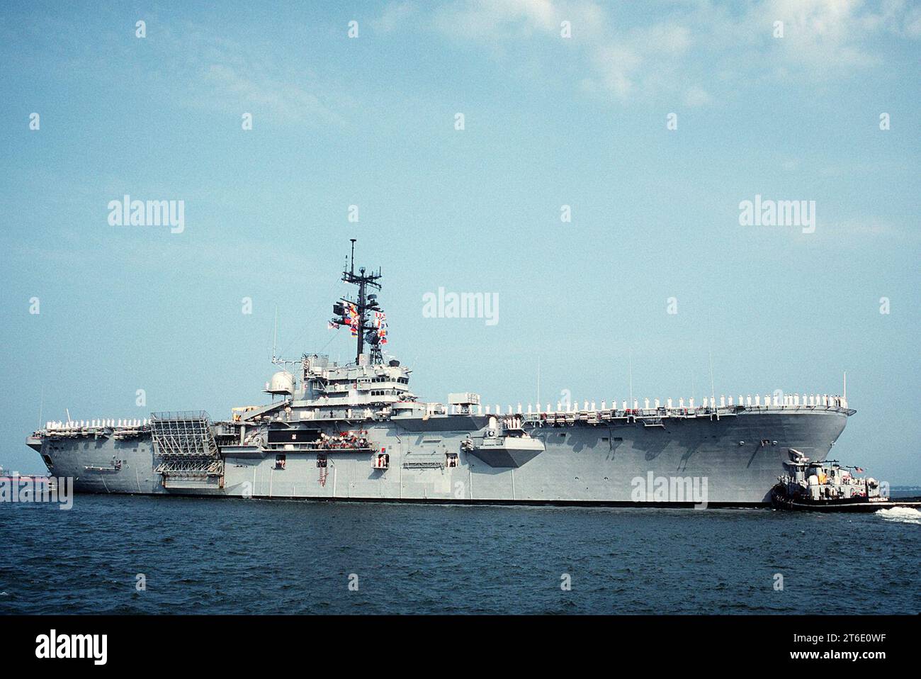 USS Guam (LPH-9) departing Naval Station Norfolk on 23 August 1990 ...