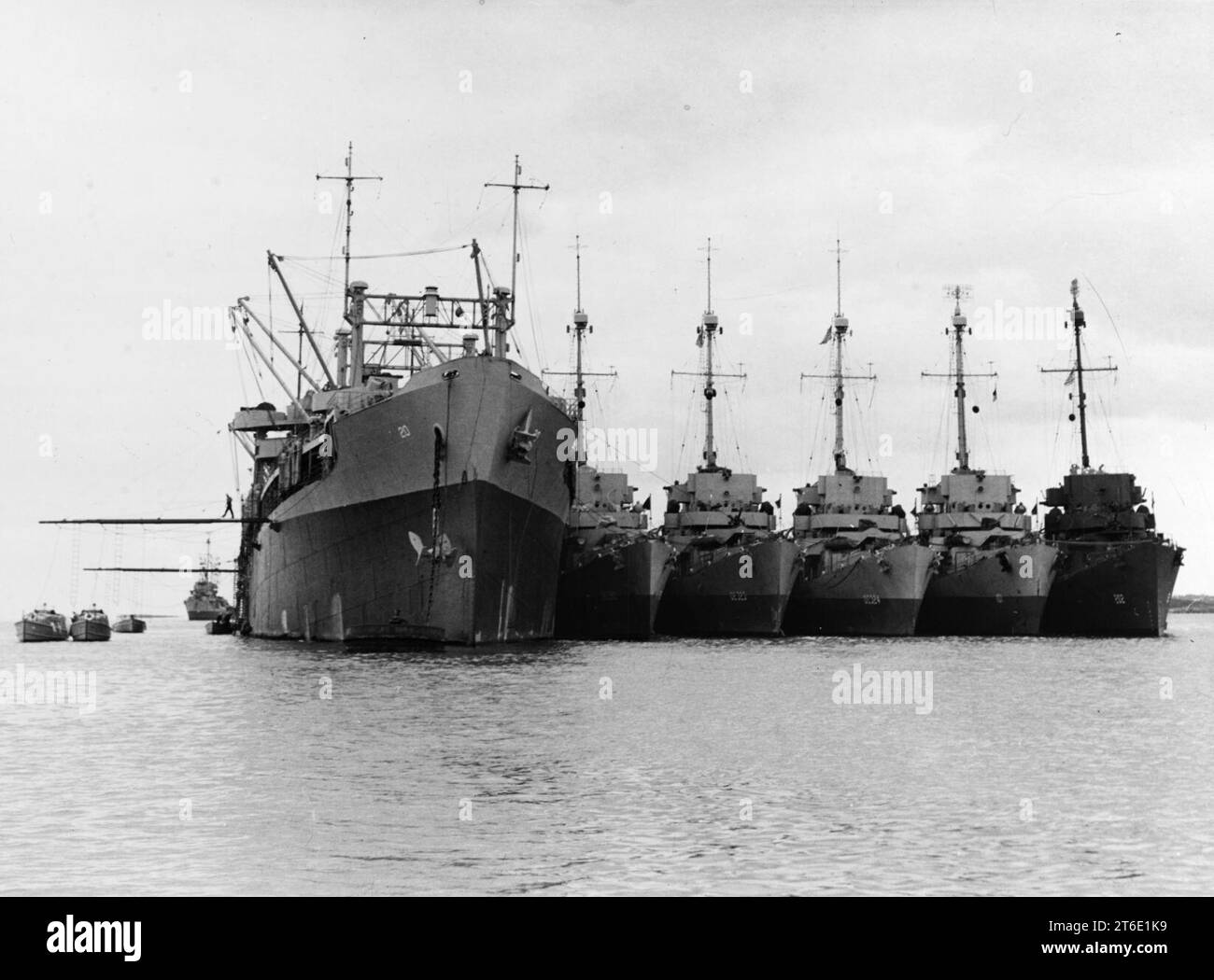 USS Hamul (AD-20) at Bermuda in early 1944, with USS Calcaterra (DE-390 ...