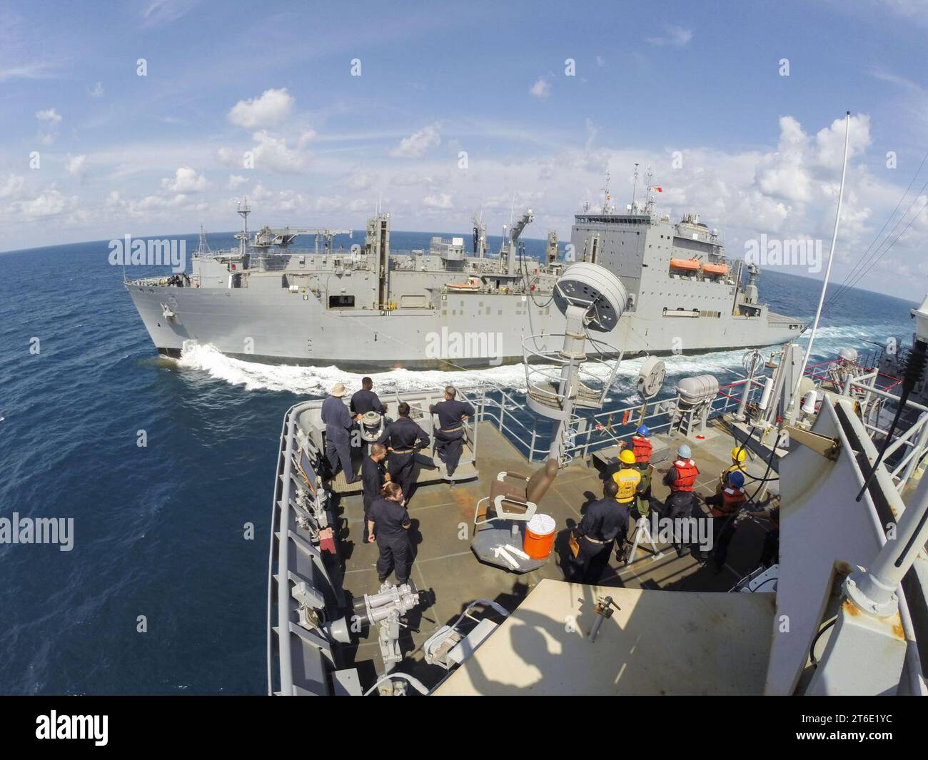 USS Harpers Ferry conducts an underway replenishment with USNS Matthew ...