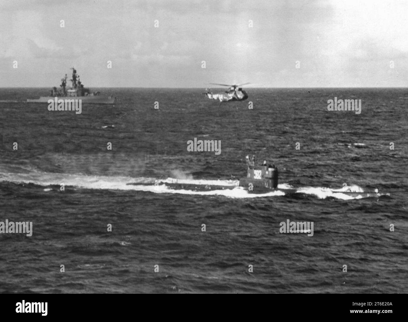 USS Harry E. Yarnell (DLG-17) and a SH-3A Sea King escort a Soviet ...