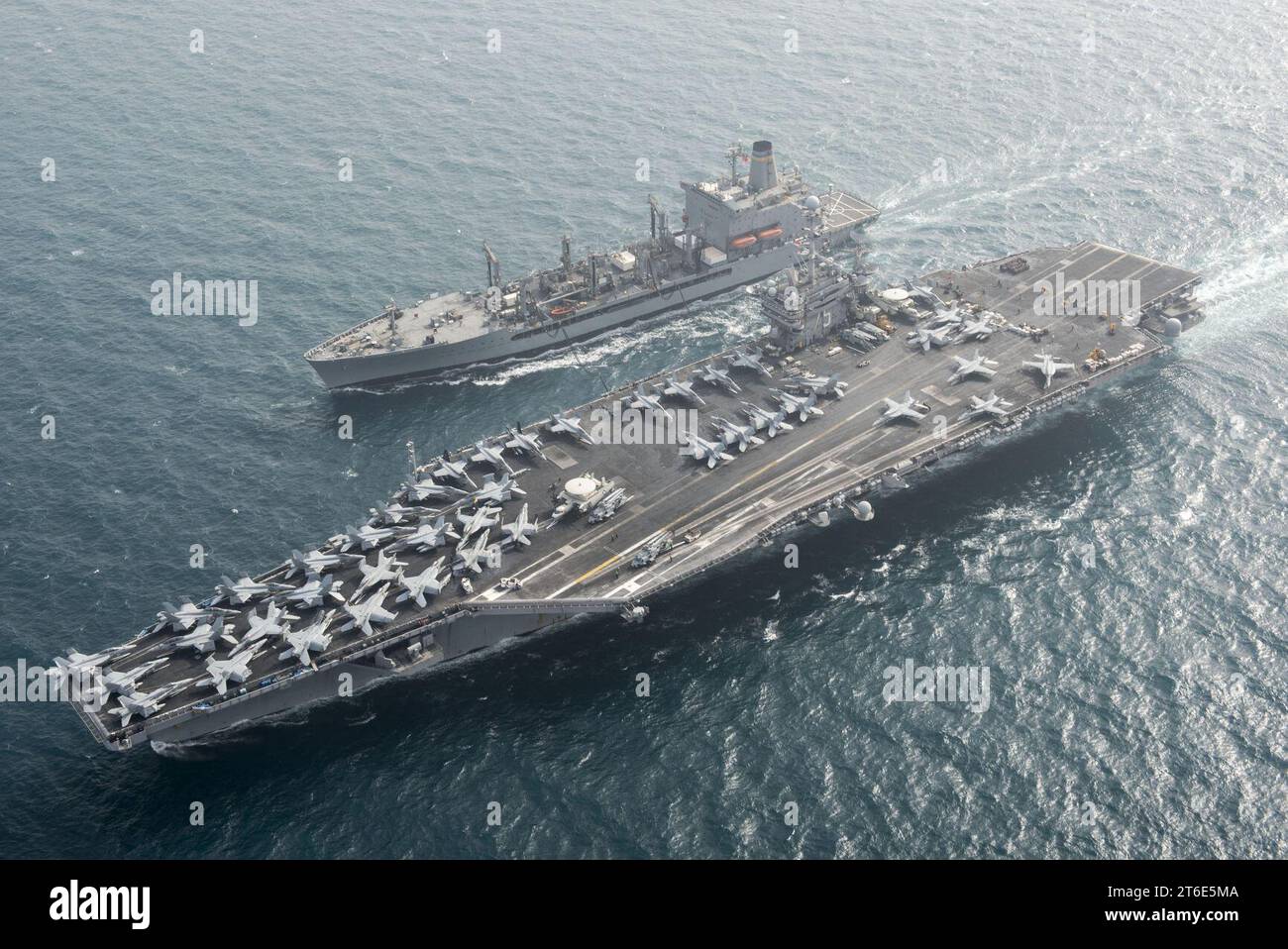 USS Harry S. Truman participates in a replenishment-at-sea with fleet ...