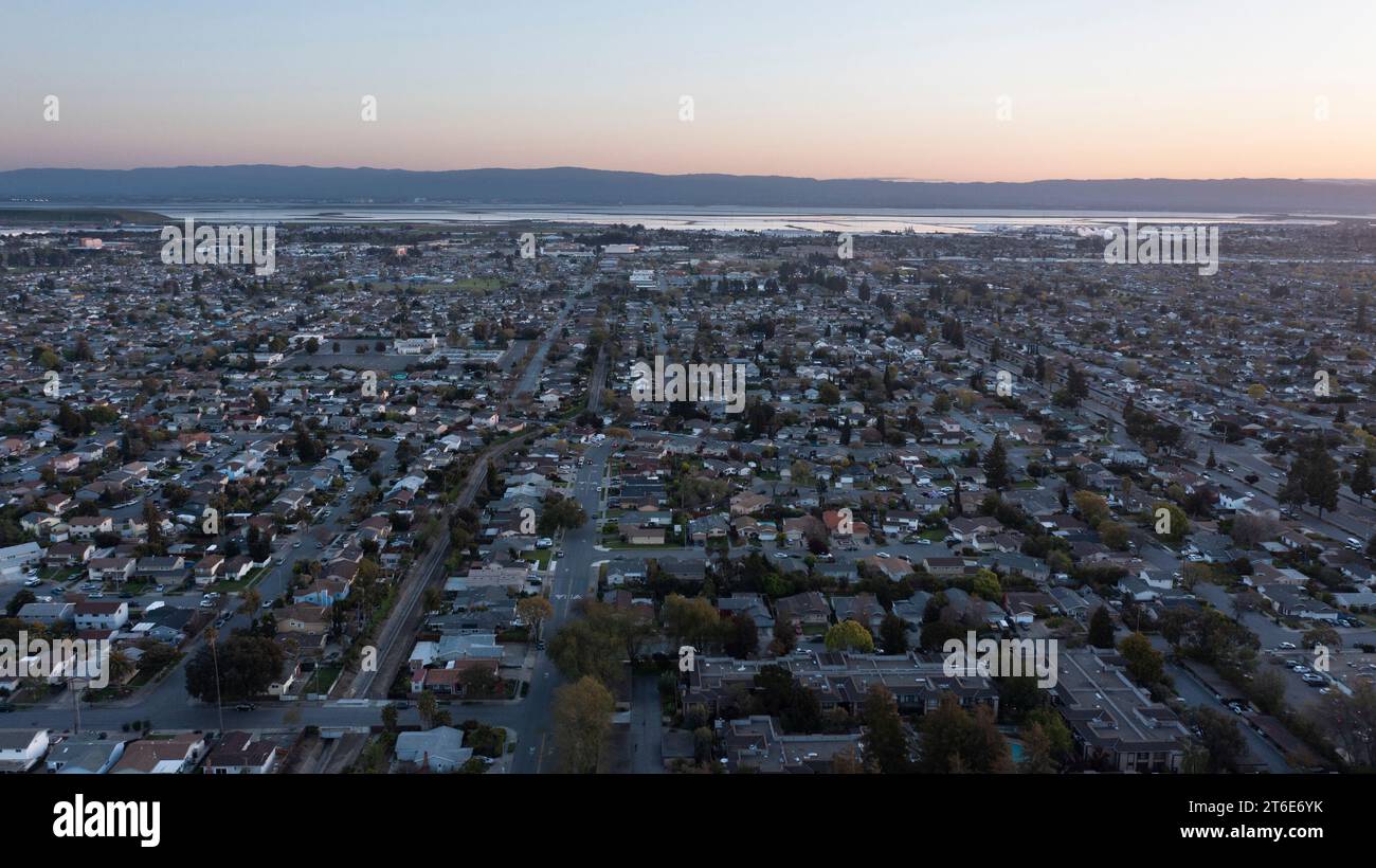 Sunset aerial view of the dense housing of Fremont, California, USA ...