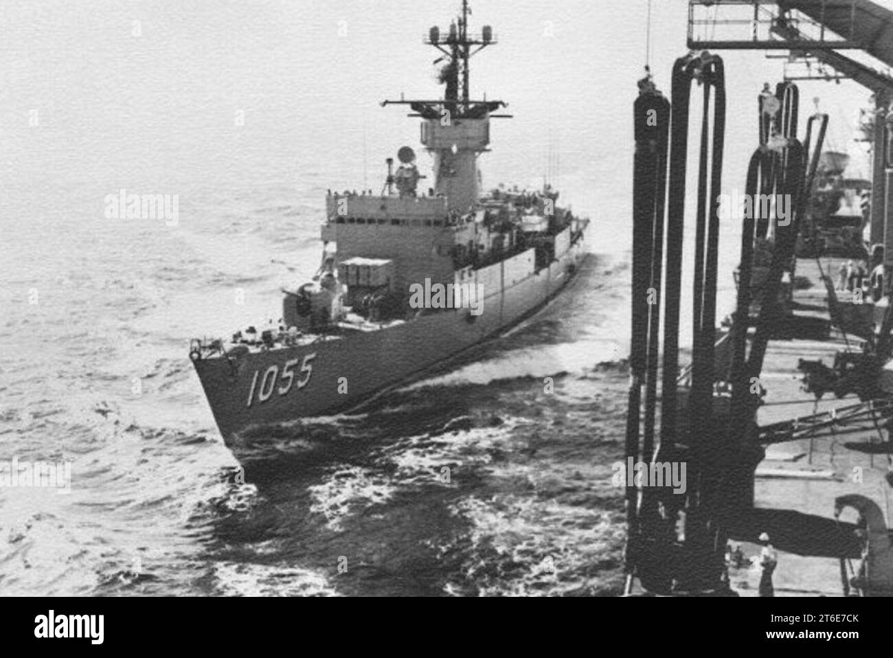 USS Hepburn (DE-1055) approaches USS Detroit (AOE-4) in 1970 Stock ...
