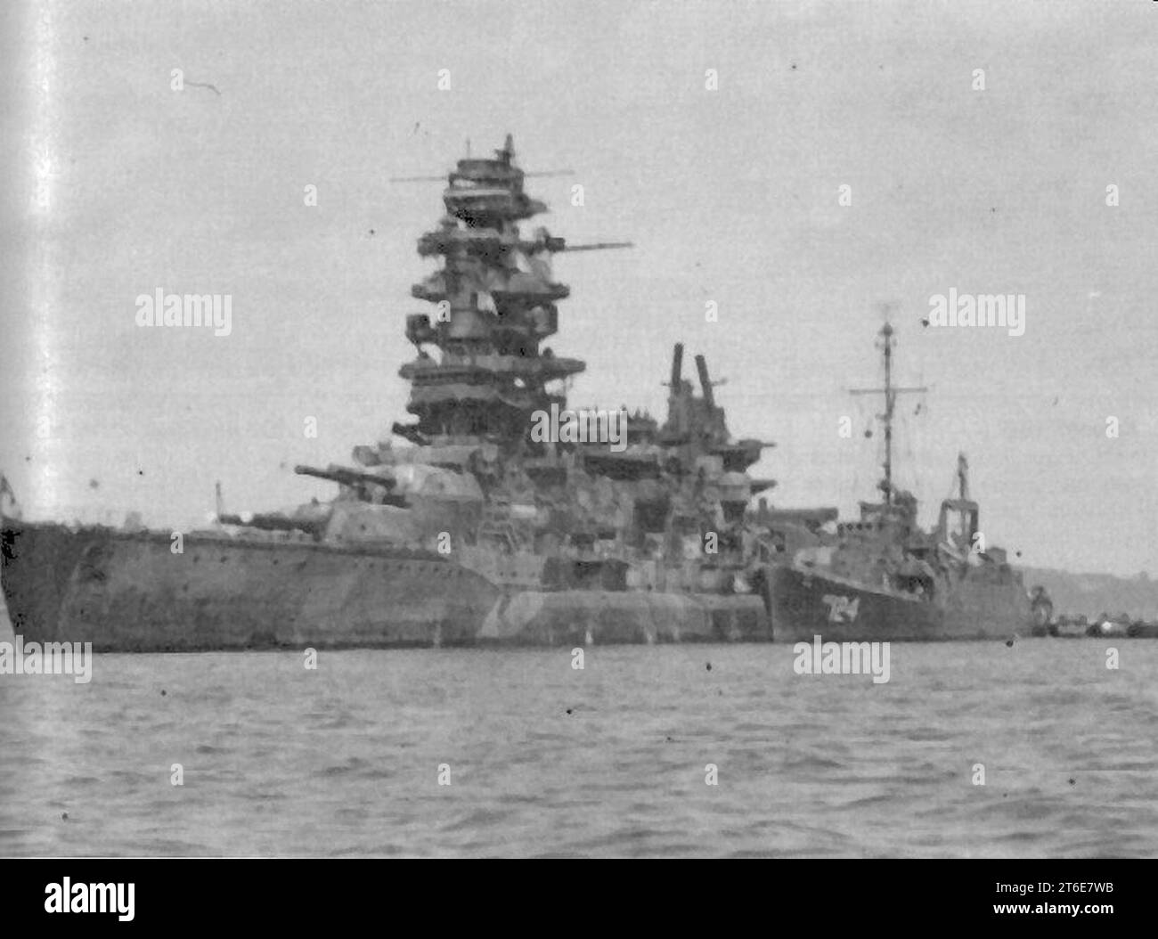 USS Horace A. Bass (APD-124) alongside the Japanese battleship Nagato ...
