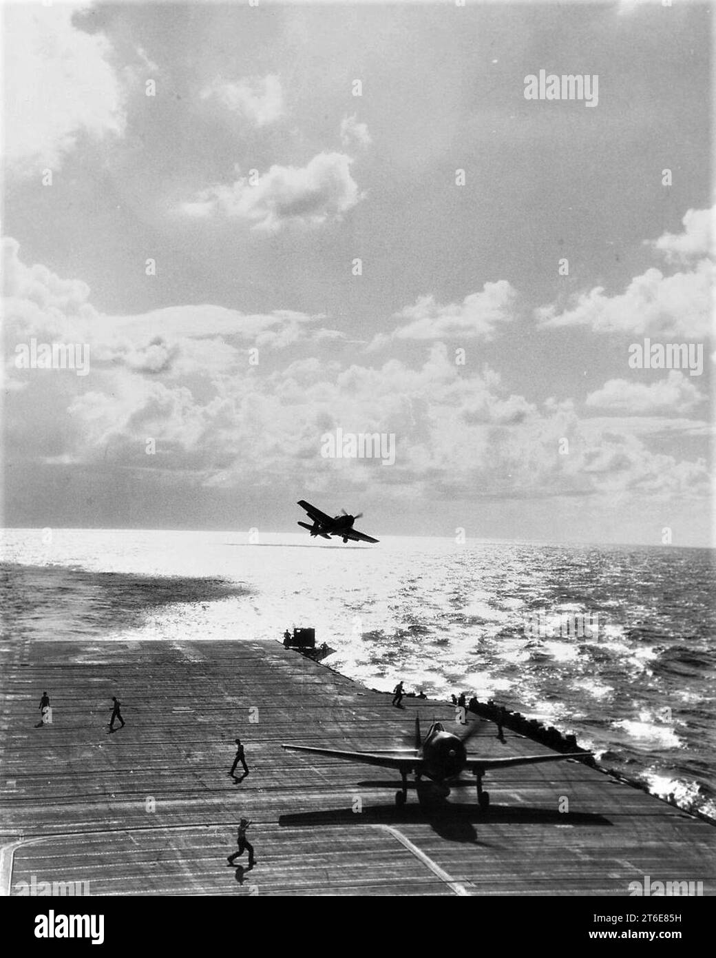 USS Hornet (CV-12) landing F6F Hellcat fighters during the Formosa Air ...