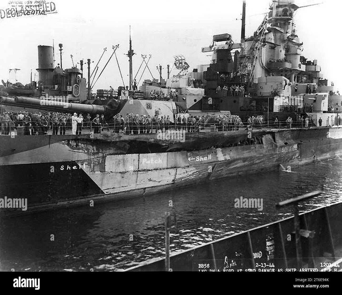 USS Indiana (BB-58) at Pearl Harbor, 13 February 1944, after collision ...