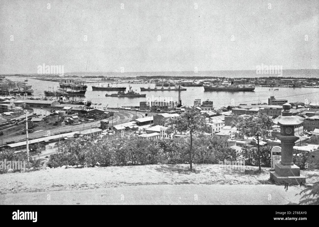 USS Jenkins (DD-447) at anchor in the harbour of Kaohsiung, Taiwan, in ...