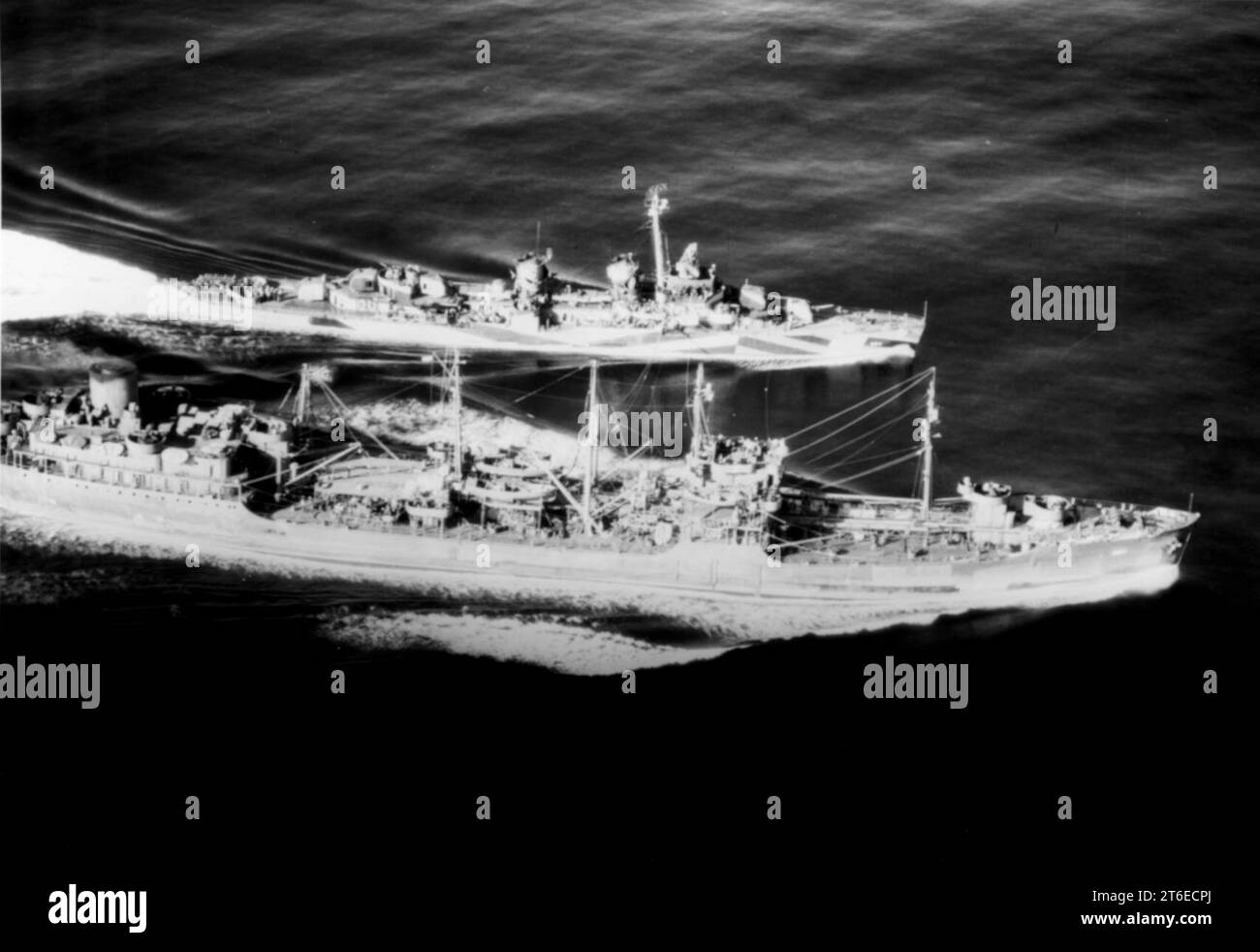 USS Kaskaskia (AO-27) refueling USS Hart (DD-594) on 16 December 1944 ...