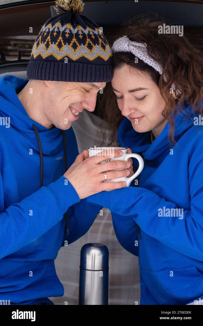 Outdoor happy couple in love posing in cold winter weather Stock Photo ...
