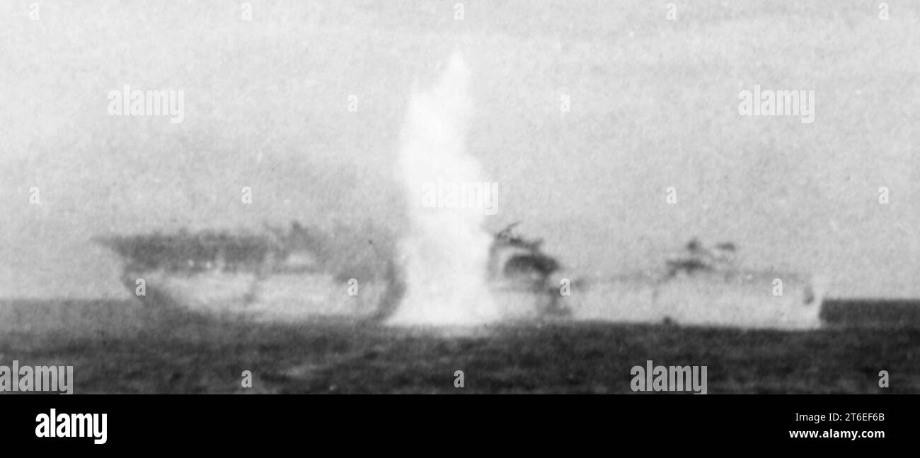 USS Langley (AV-3) is hit by torpedo on 27 February 1942 (cropped Stock ...