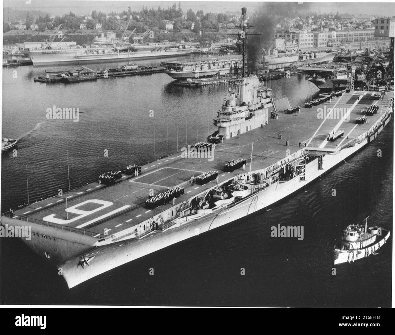USS Lexington (CVA-16) leaving the Puget Sound Naval Shipyard, circa in ...