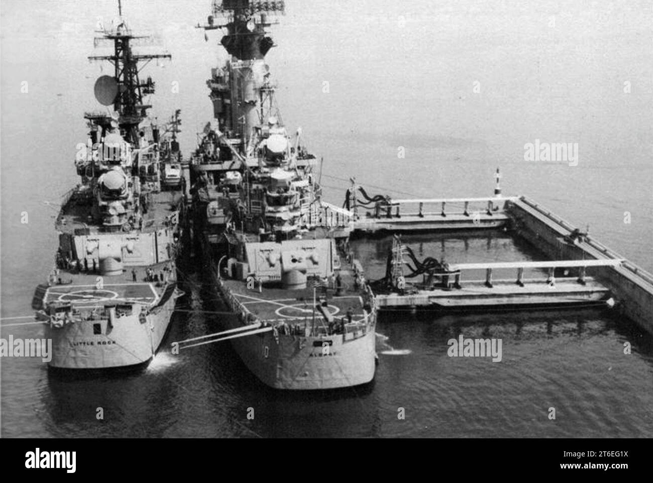 USS Little Rock (CG-4) and USS Albany (CG-10) docked at the refueling ...
