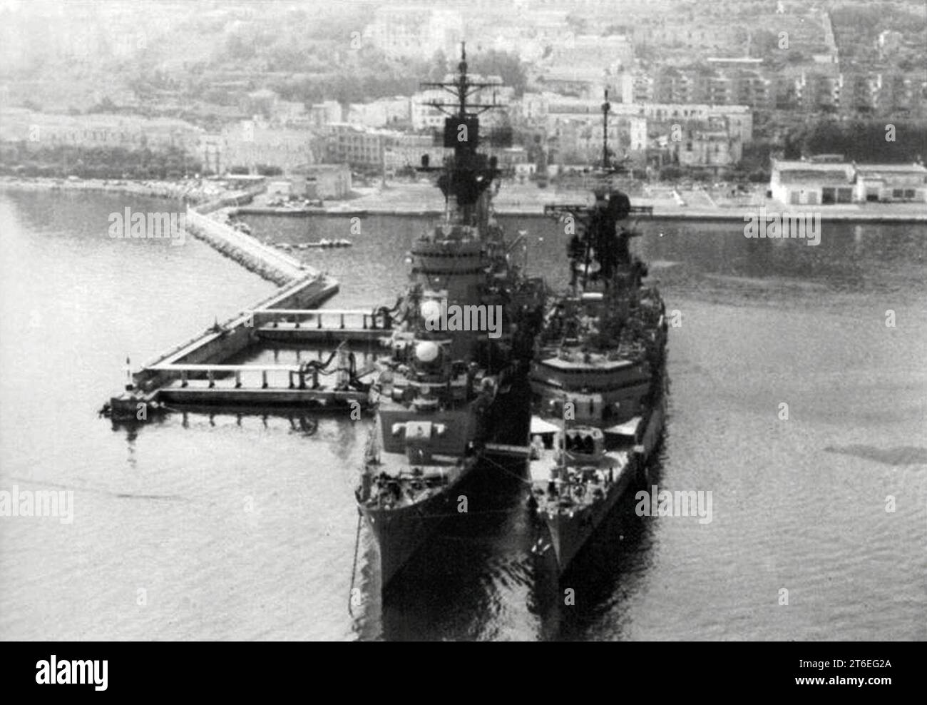 USS Little Rock (CG-4) and USS Albany (CG-10) docked at the refueling ...