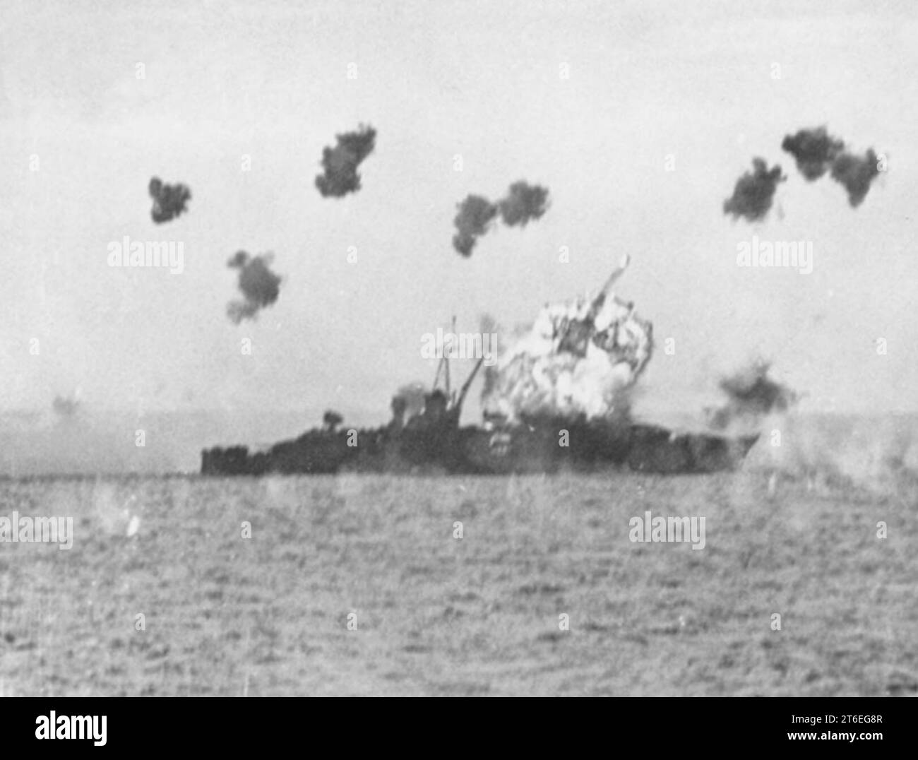USS Louisville (CA-28) is hit by a kamikaze in Lingayen Gulf on 6 ...