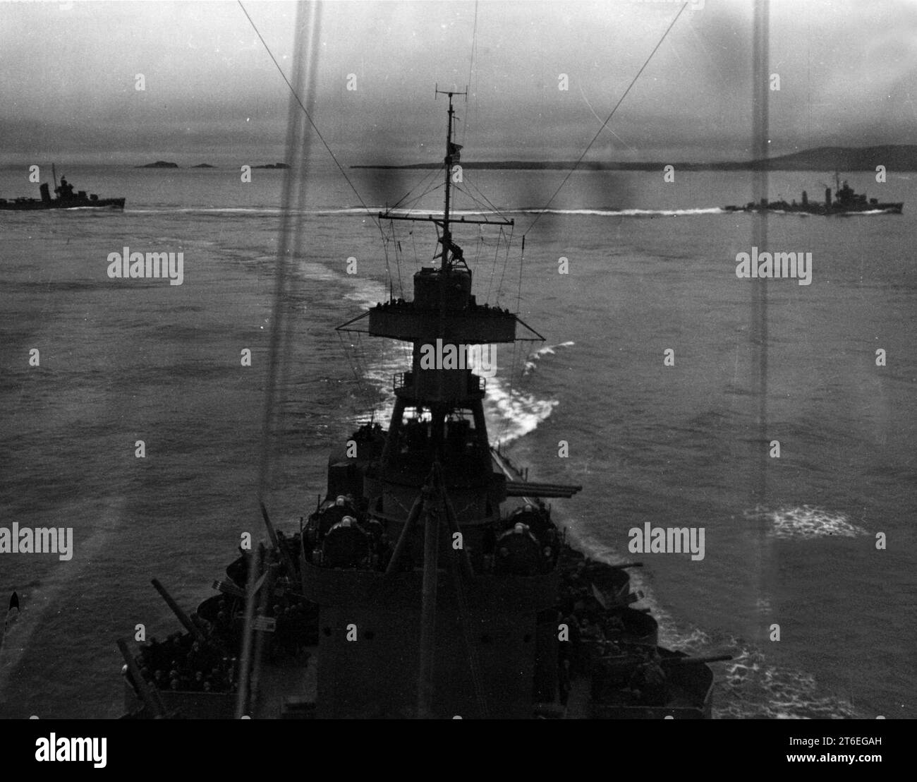 USS Louisville (CA-28), USS Lansdowne (DD-486) and USS Hughes (DD-410 ...