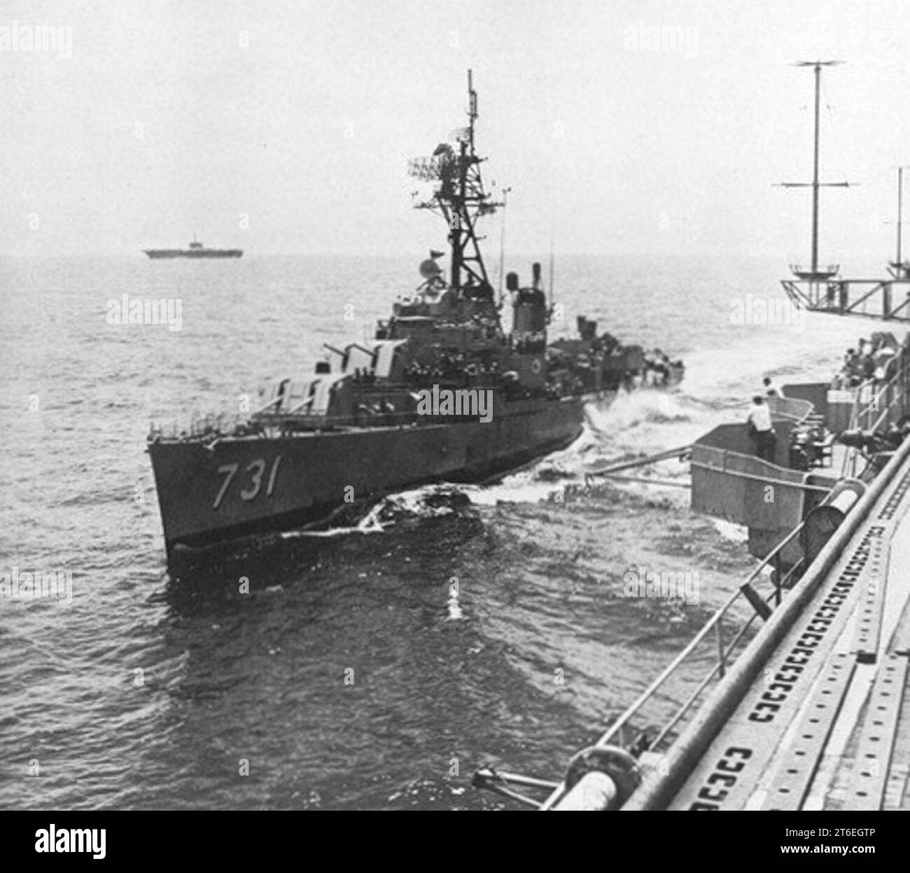 USS Maddox (DD-731) is refueled in the South China Sea in 1964 Stock ...